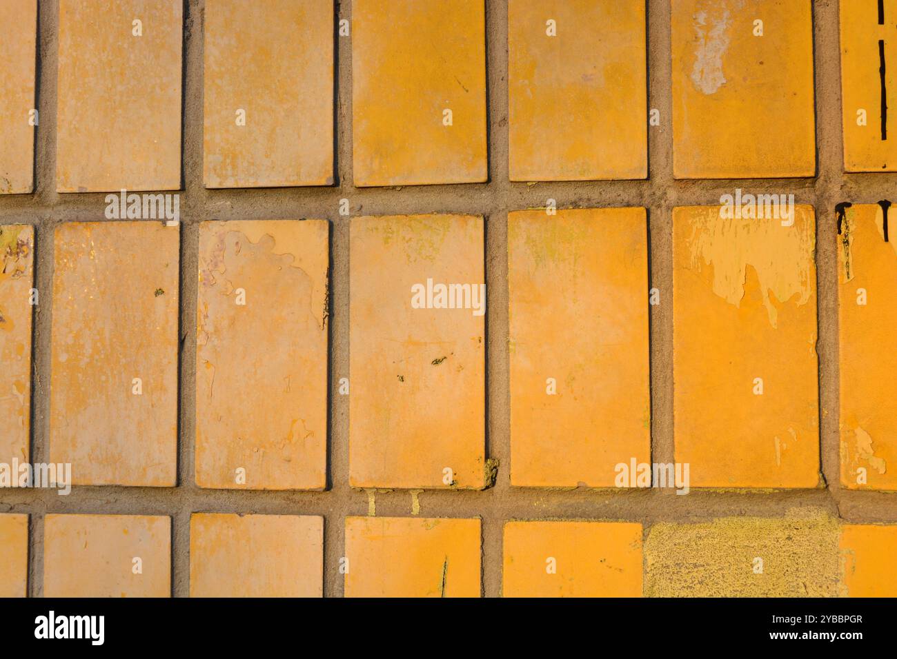 Beautiful and unusual building materials, building backgrounds. Yellow ...