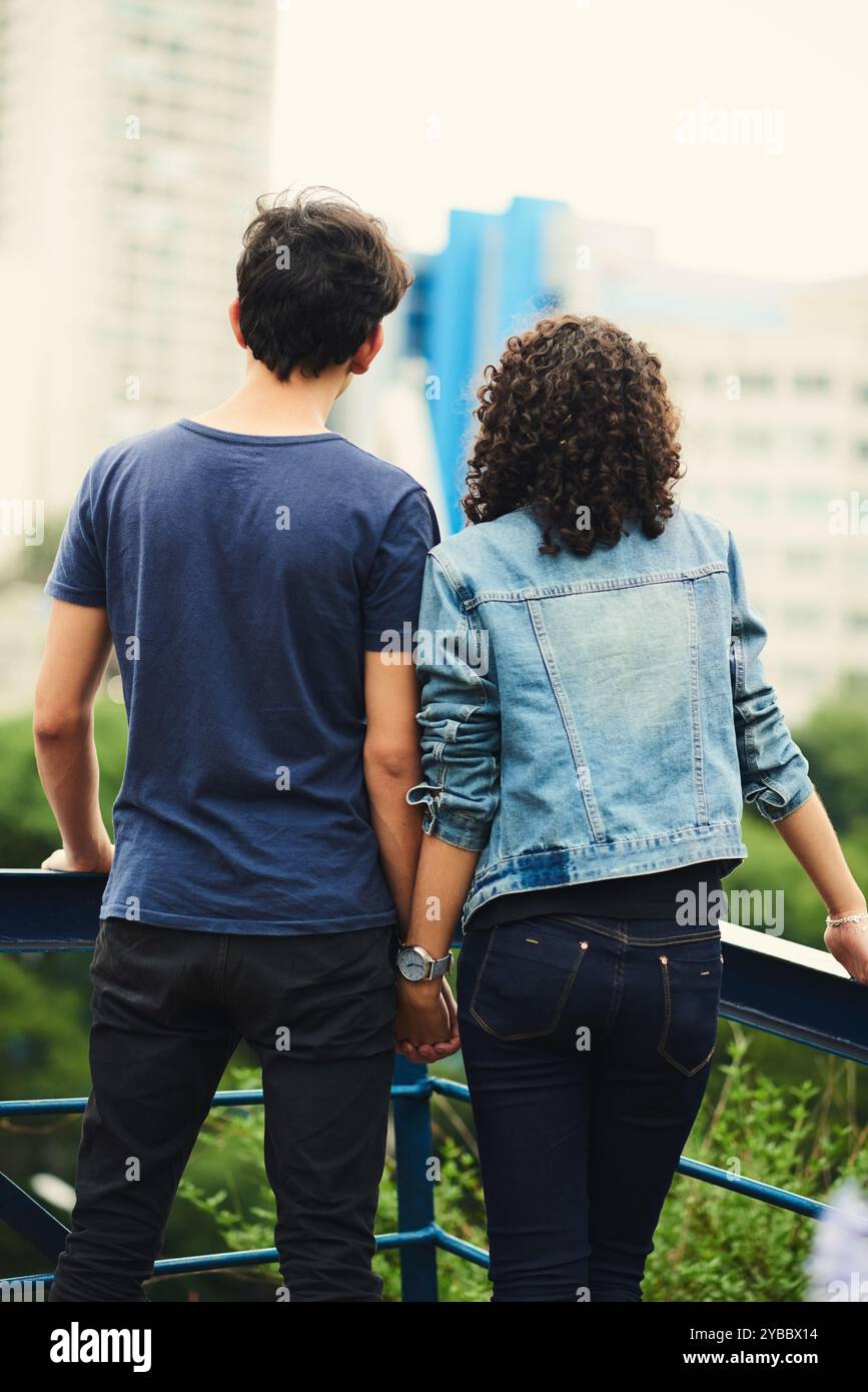 Couple, holding hands and outdoor view for love, sightseeing and ...