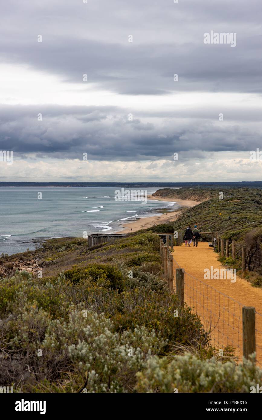 Coastal trail with scenic stormy ocean view at Bluff Barwon Heads Stock ...