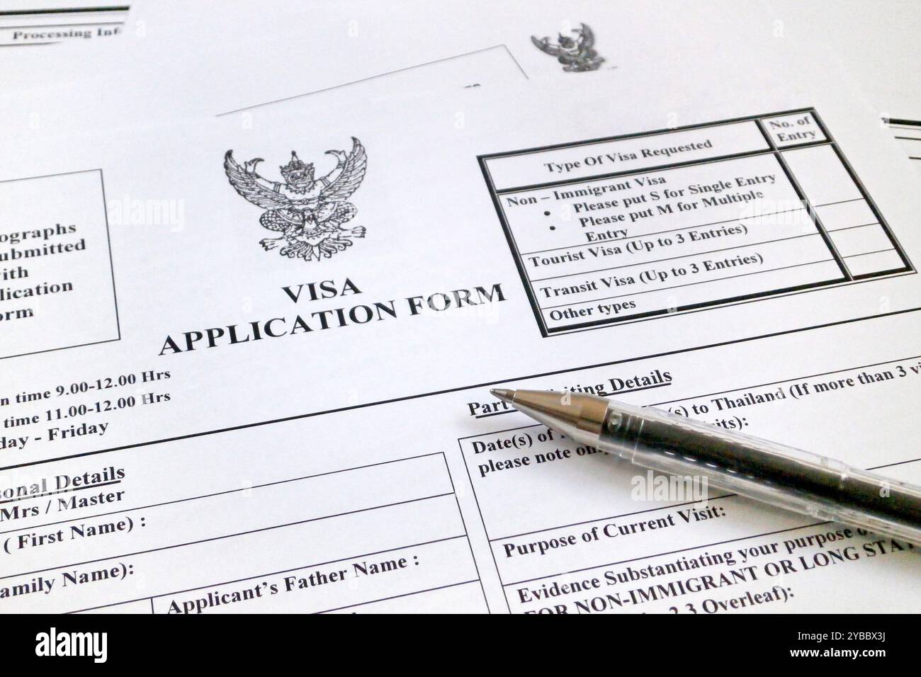 A pen on the top of a visa application form for Thailand Stock Photo ...