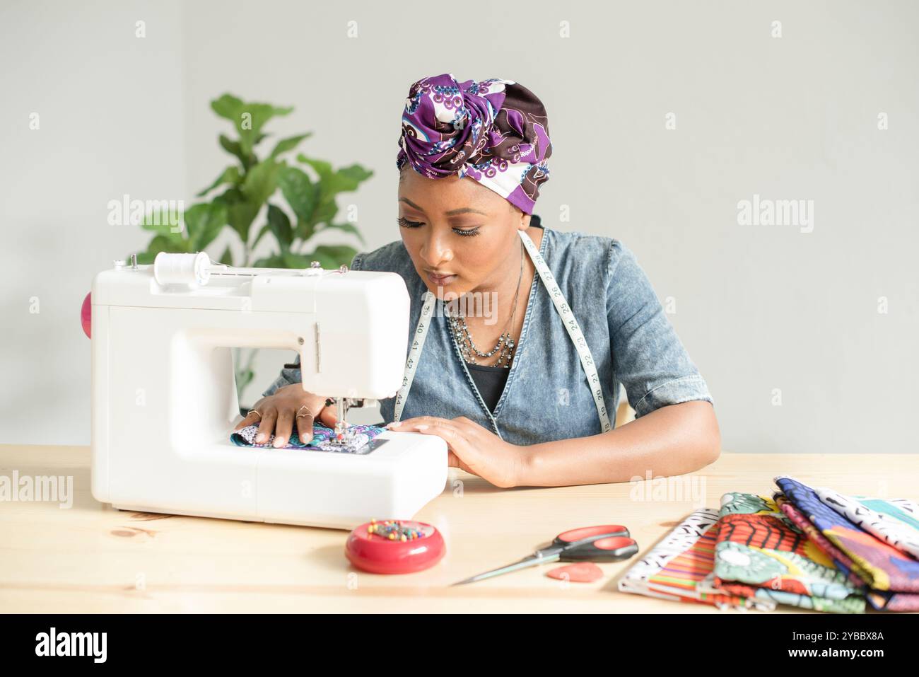 Woman sowing on machine hi-res stock photography and images - Alamy
