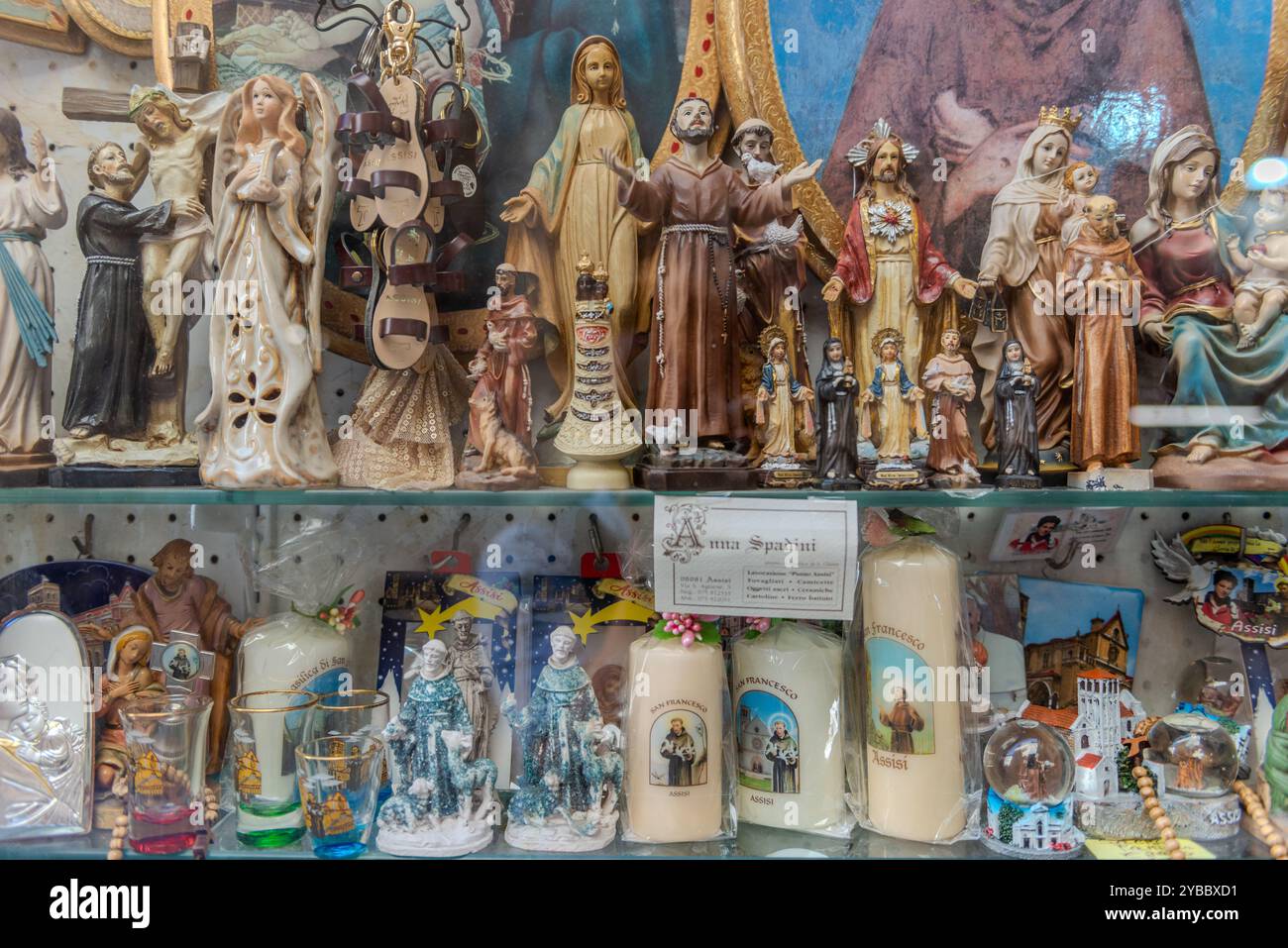 Catholic promotional items in a display case Stock Photo - Alamy