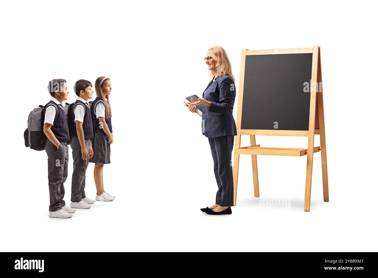 Full length profile shot of teacher talking to pupils isolated on white ...