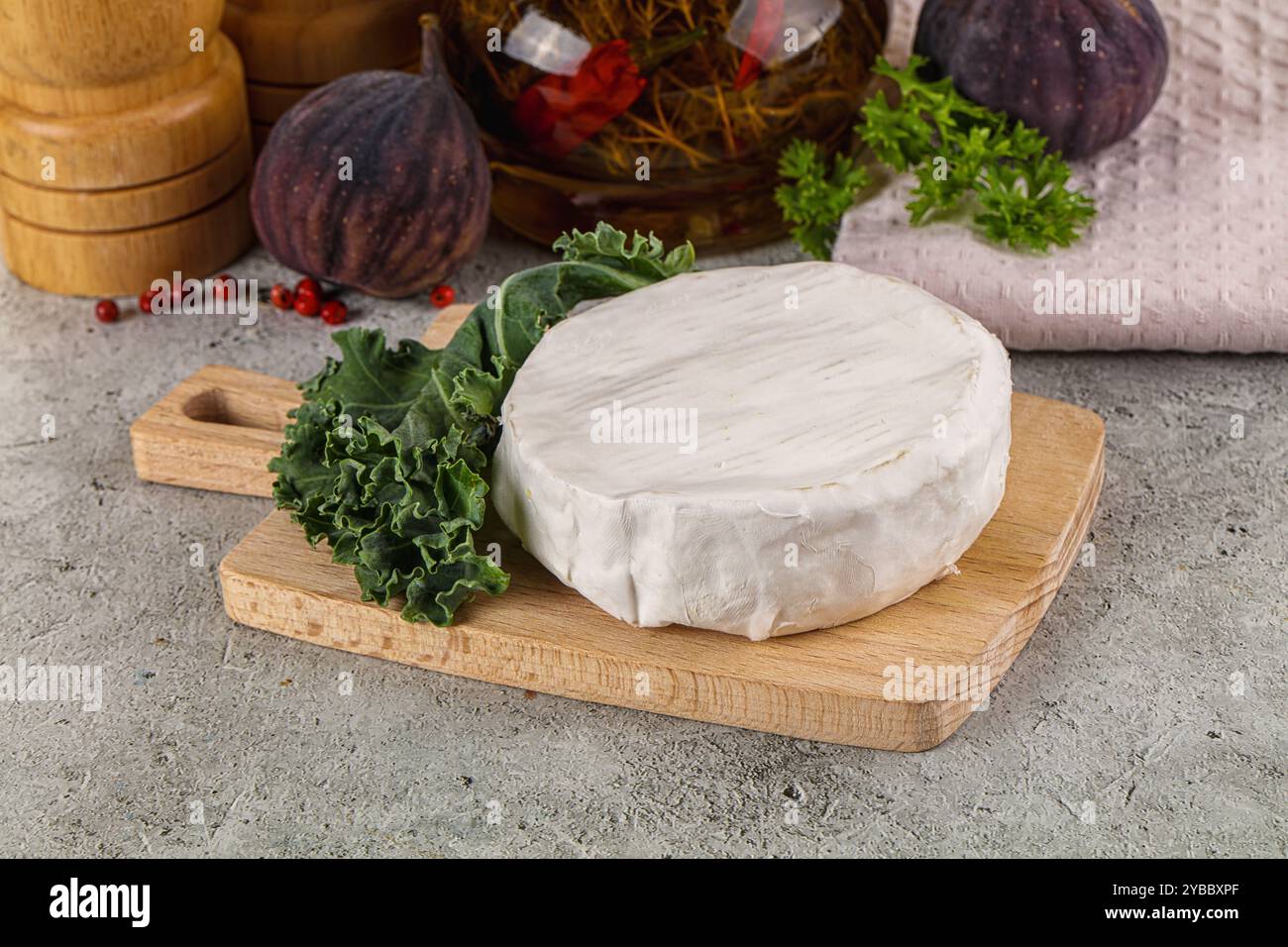 Gourmet round creamy Camembert cheese served fig Stock Photo - Alamy