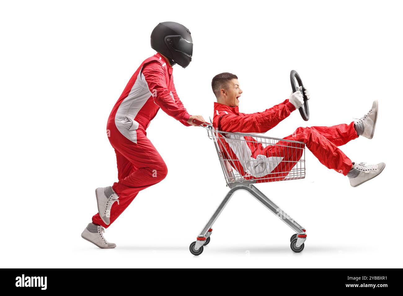 Excited fast car racer riding in a supermarket shopping cart isolated ...