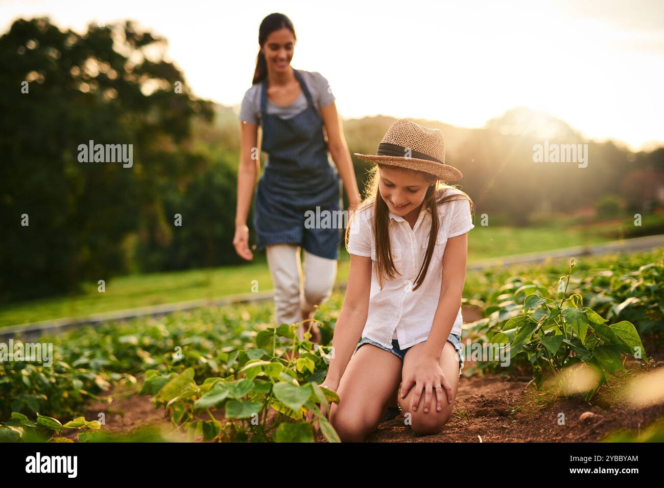 Farm, crops and woman with child, outdoor and soil analysis with mom ...