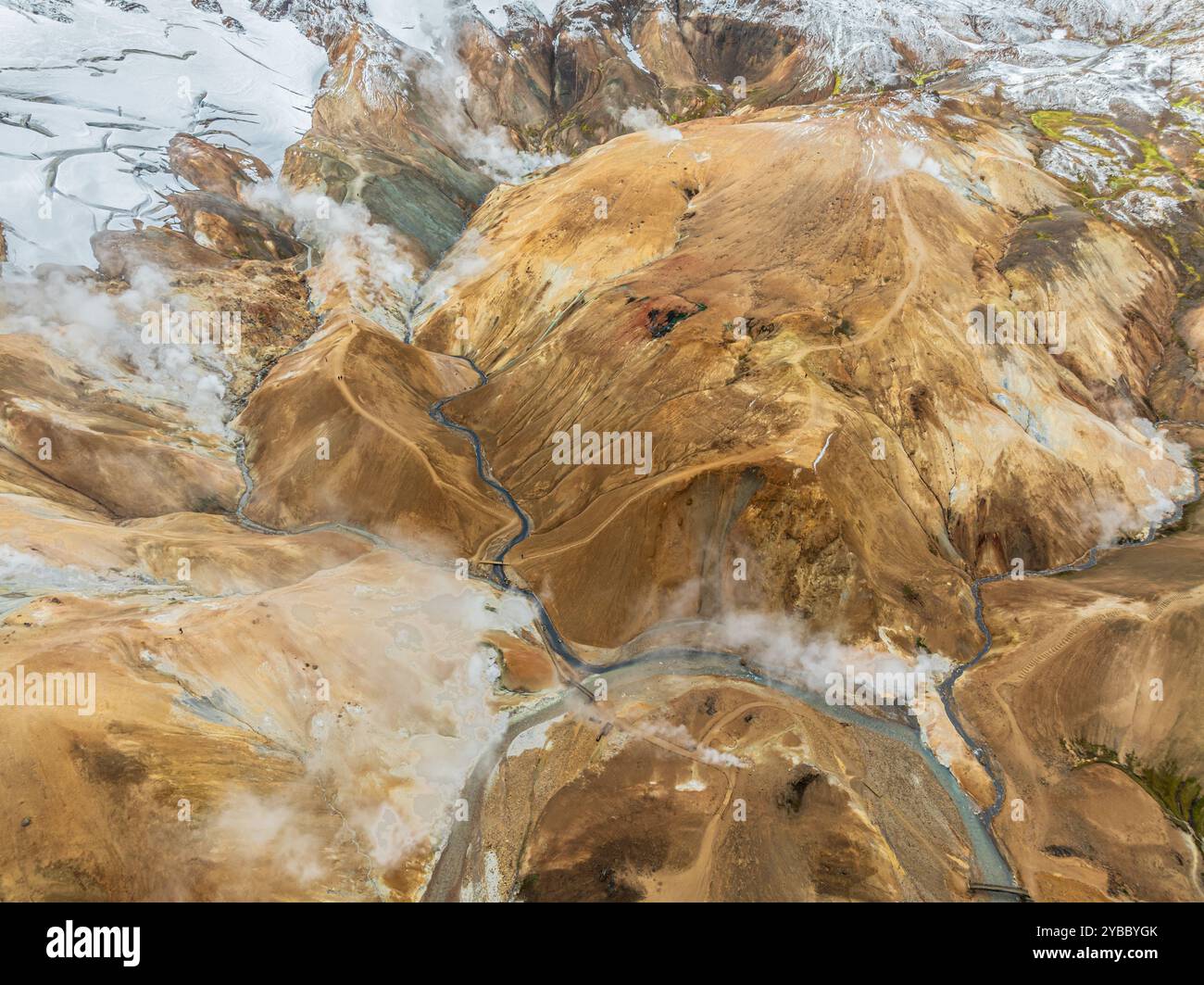 Steaming hot springs and colourful rhyolite mountains, aerial view ...