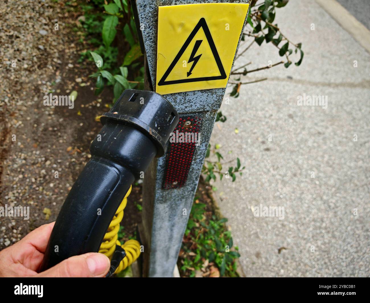 electric vehicle charging station sign, power plug and green mobility ...