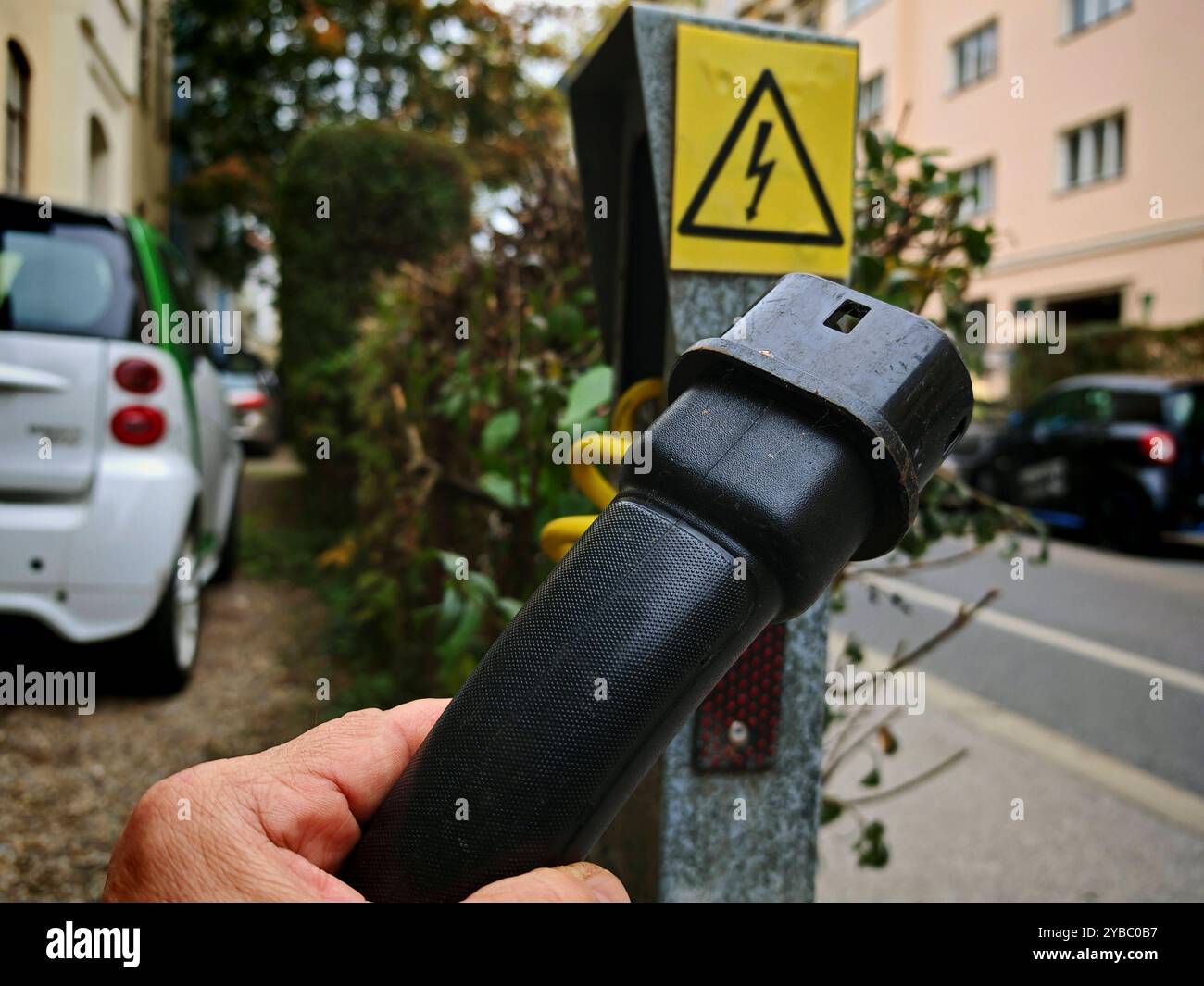 electric vehicle charging station sign, power plug and green mobility ...