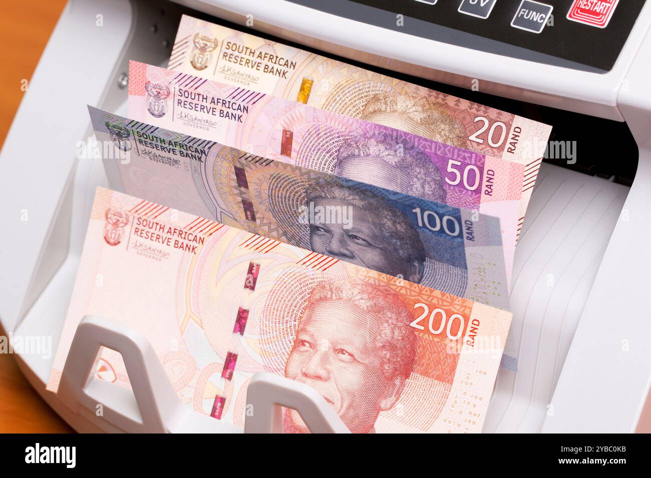 South African money - rand in the counting machine Stock Photo - Alamy