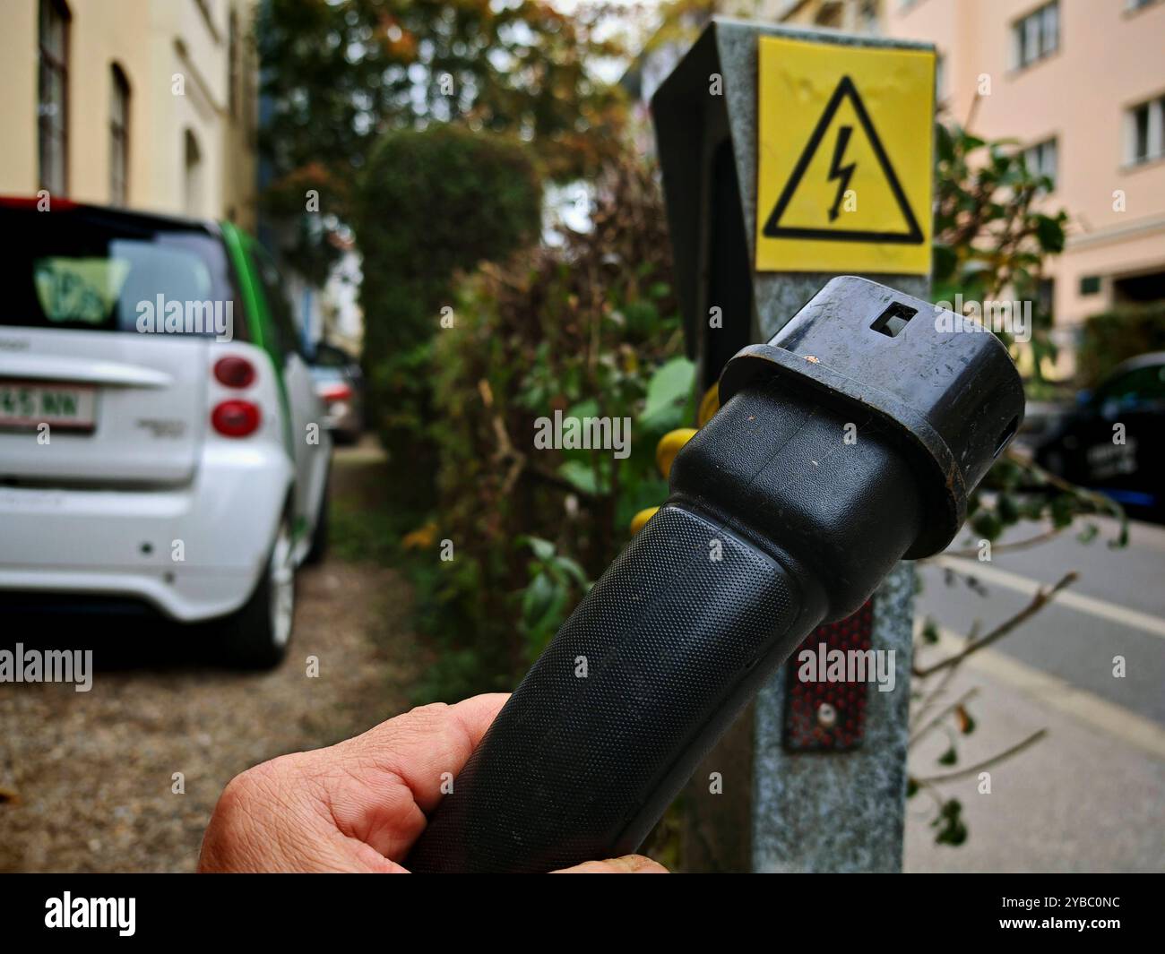 electric vehicle charging station sign, power plug and green mobility ...