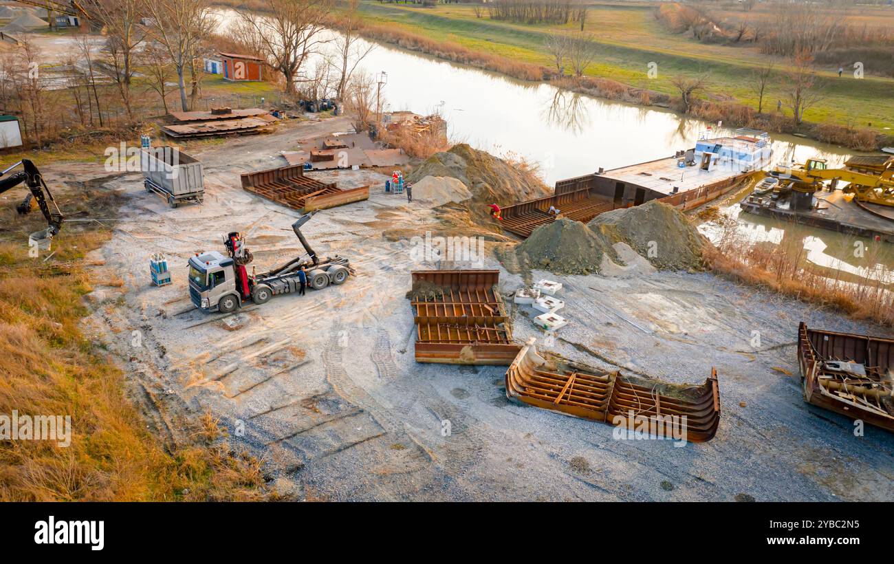 Above view excavator and tow truck together they are pull out part of ...