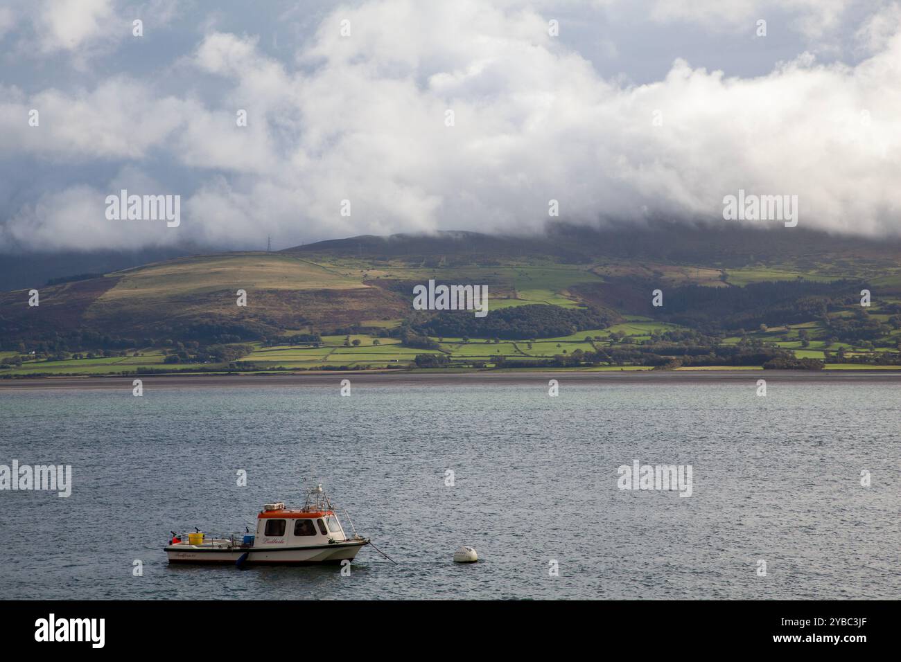 A view of mainland Wales as seen from Beaumaris Pier, Anglesey, Wales ...