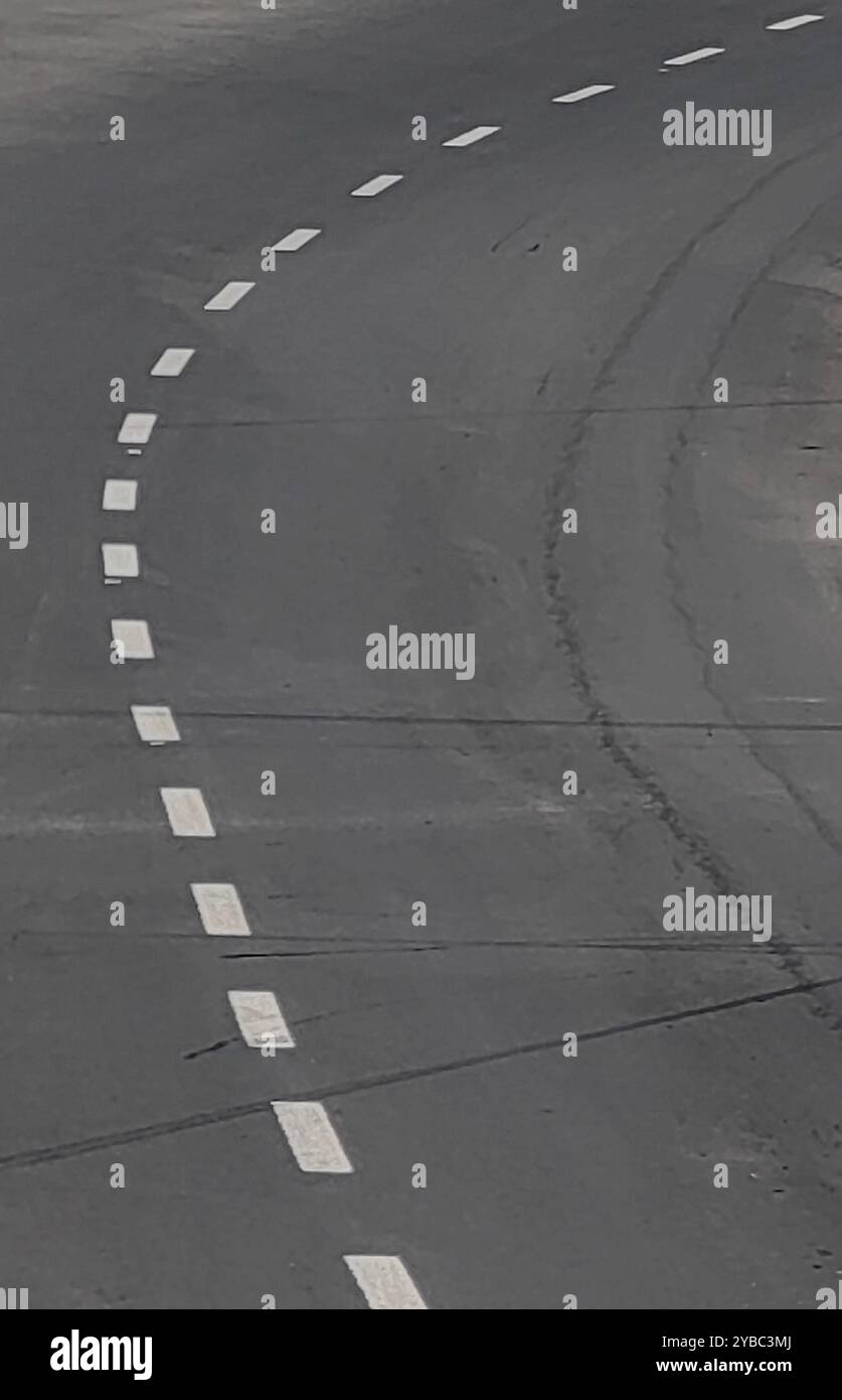 Curved White Dashed Line on Asphalt Road Under Sunny day Stock Photo ...