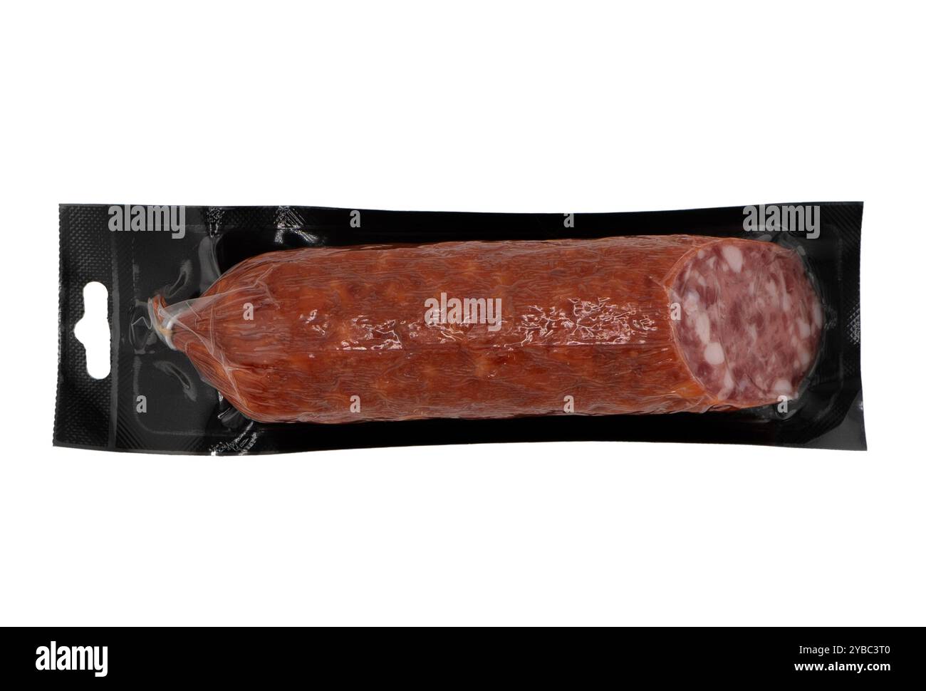 Top view of smoked meat salami in vacuum package isolated on black ...