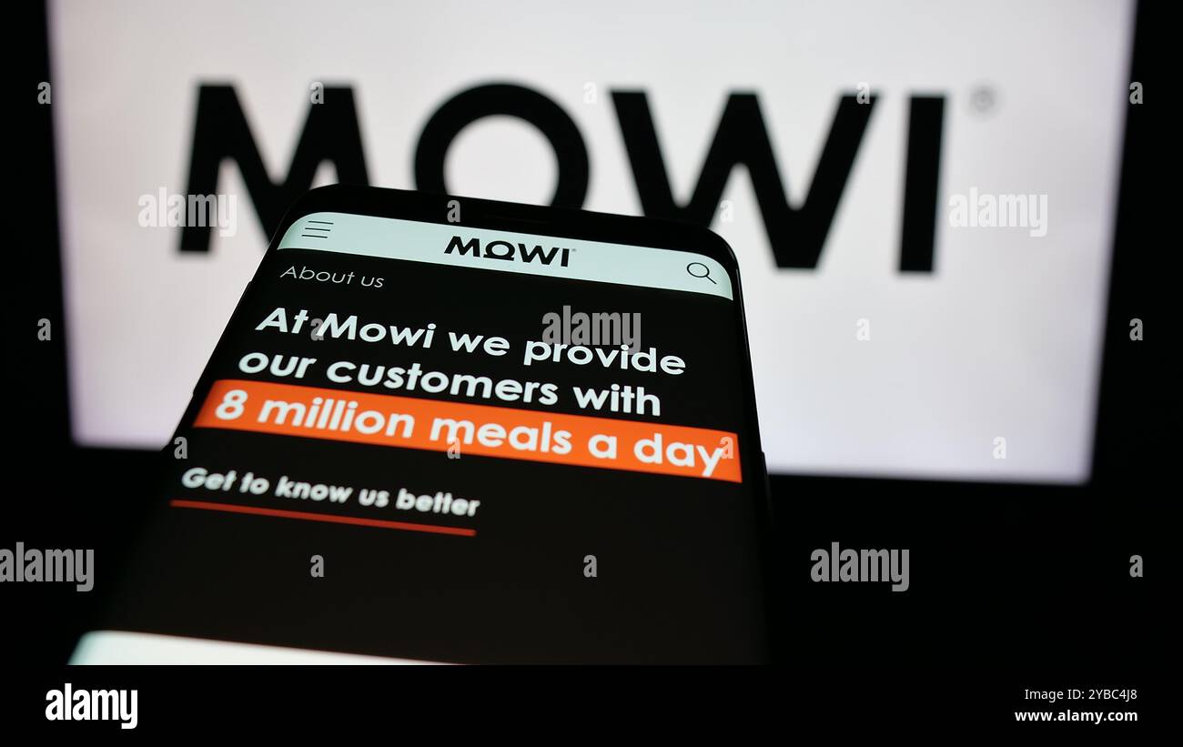 Mobile phone with website of Norwegien seafood company Mowi ASA on ...