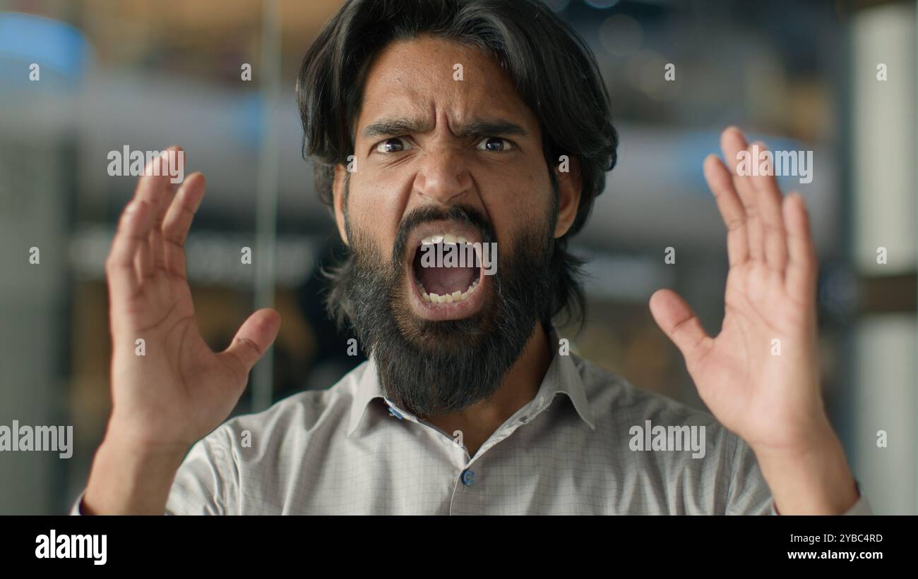 Close-up emotional angry aggressive furious displeased stressful ...