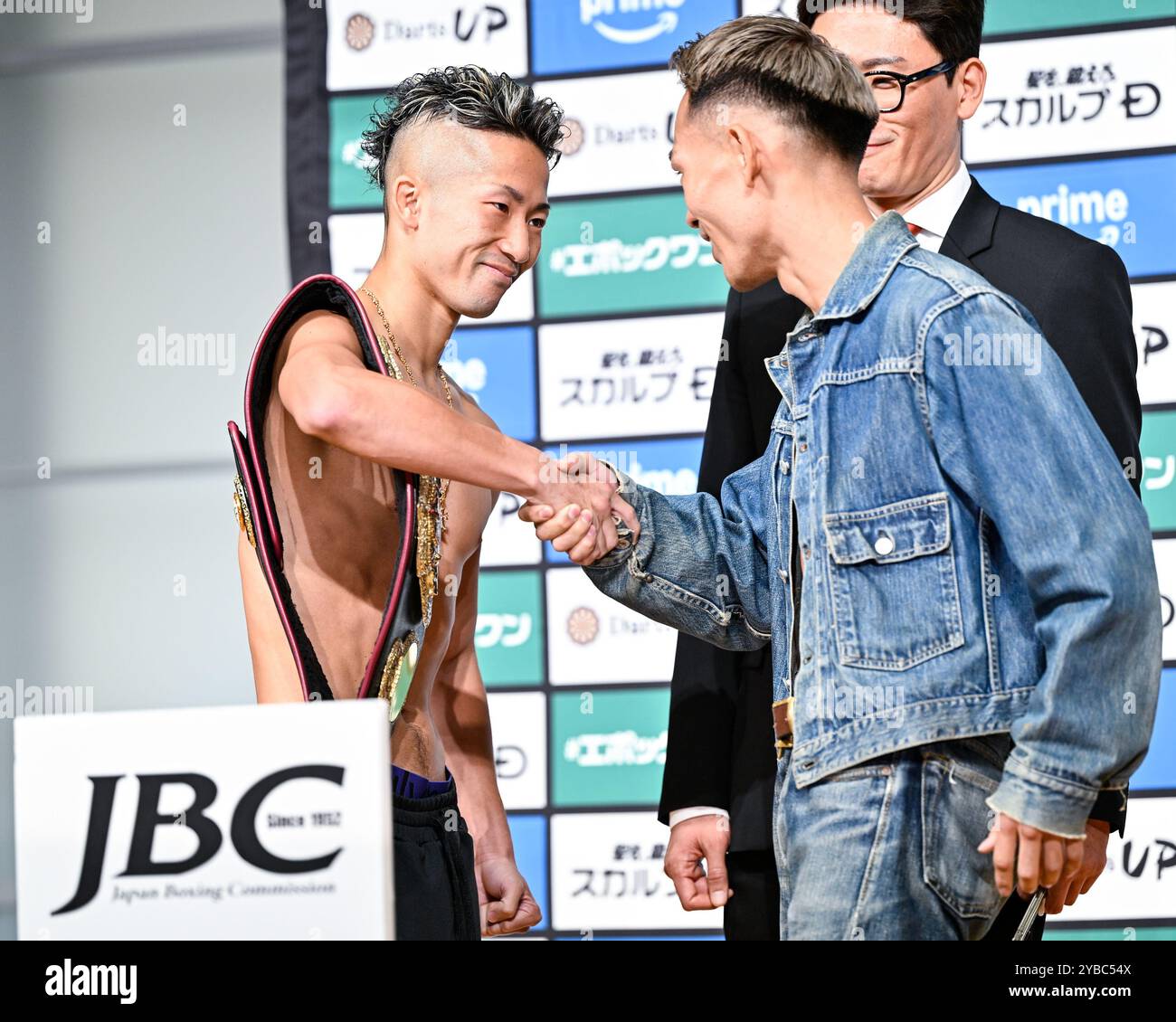 Tokyo, Japan. 12th Oct, 2024. Champion Takuma Inoue, left, and ...