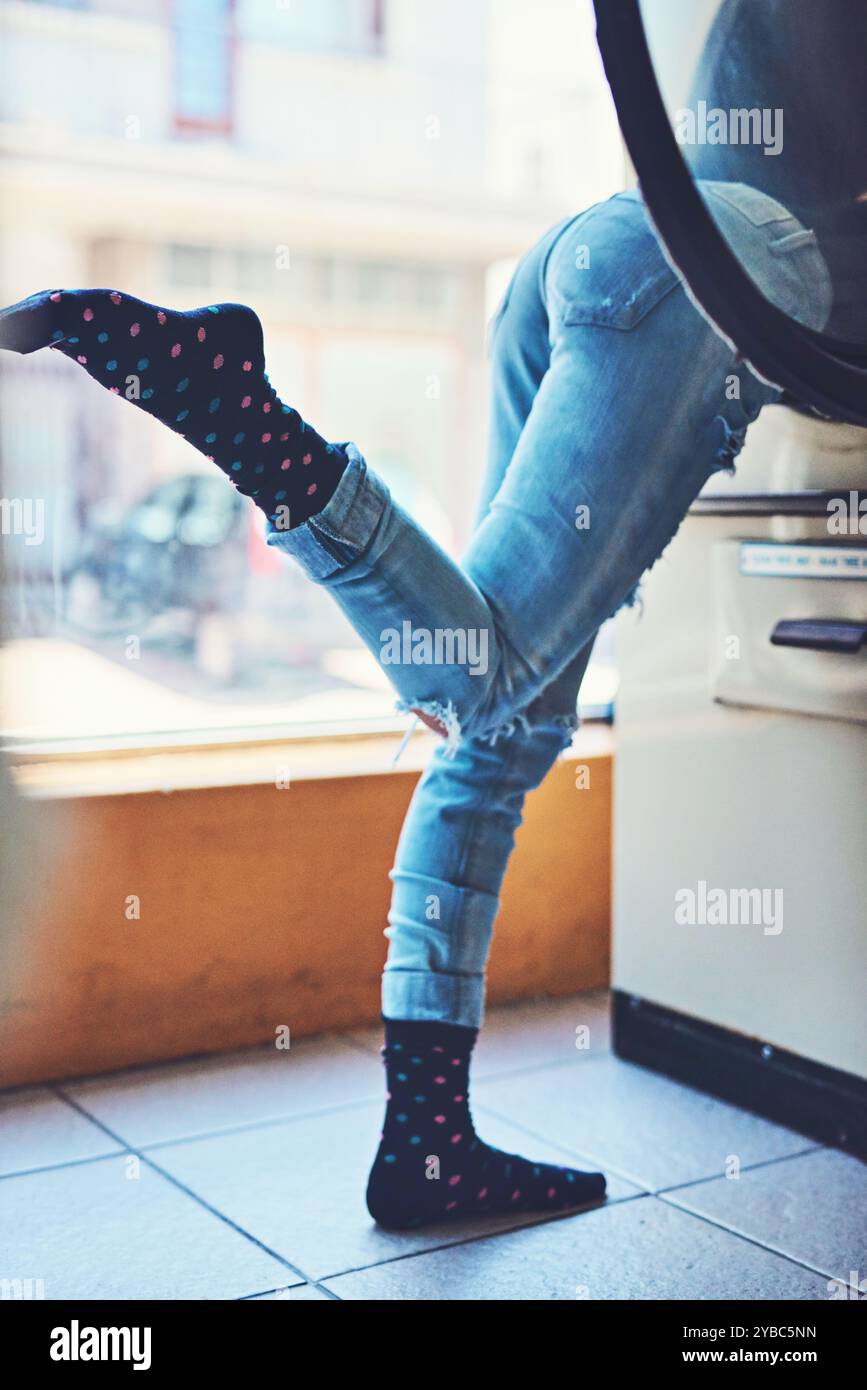 Clothes, woman and head in washing machine for laundry, legs and jeans ...