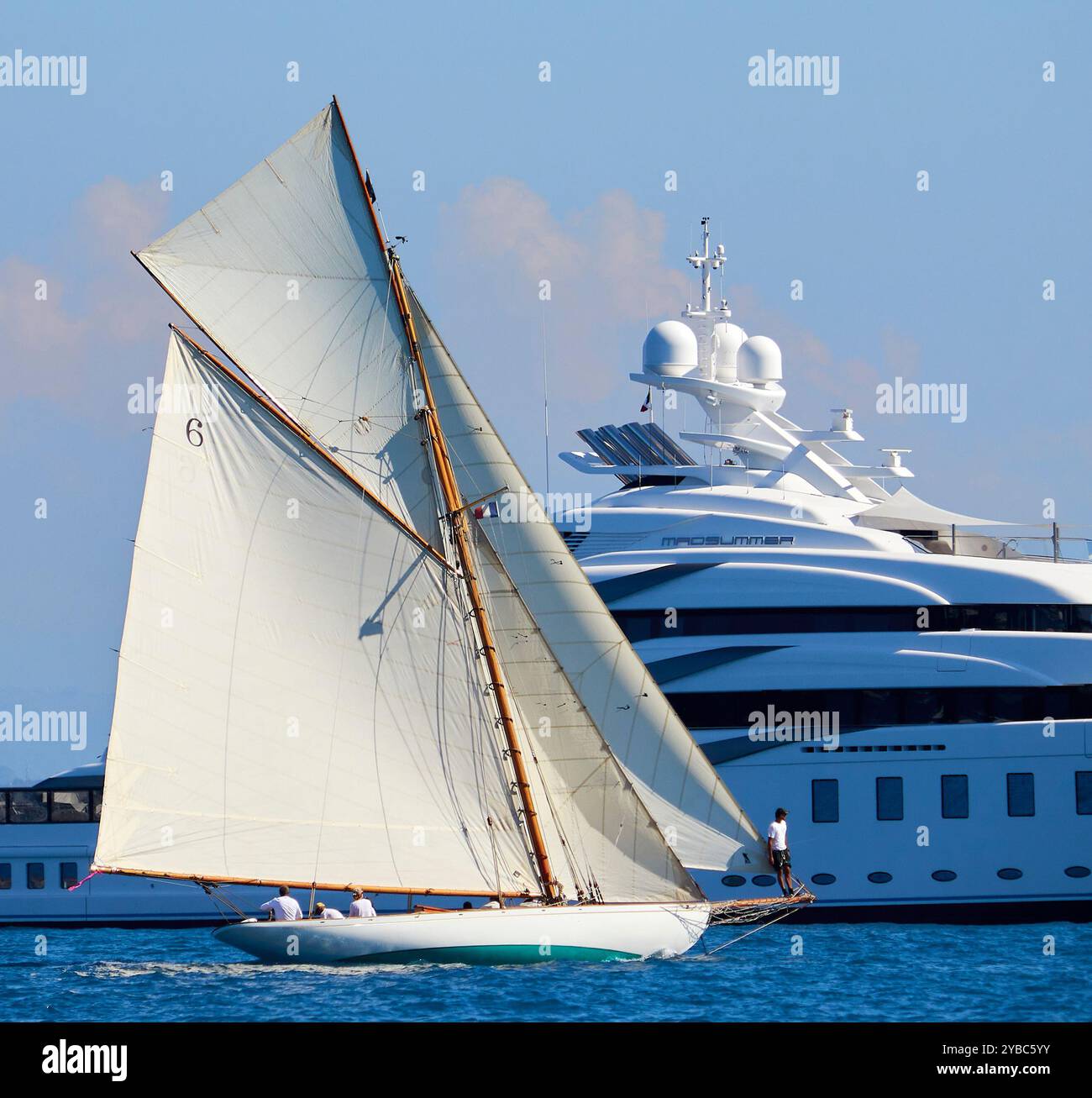 Classic sailing yacht EVA with the superyacht, Madsummer behind Stock Photo - Alamy