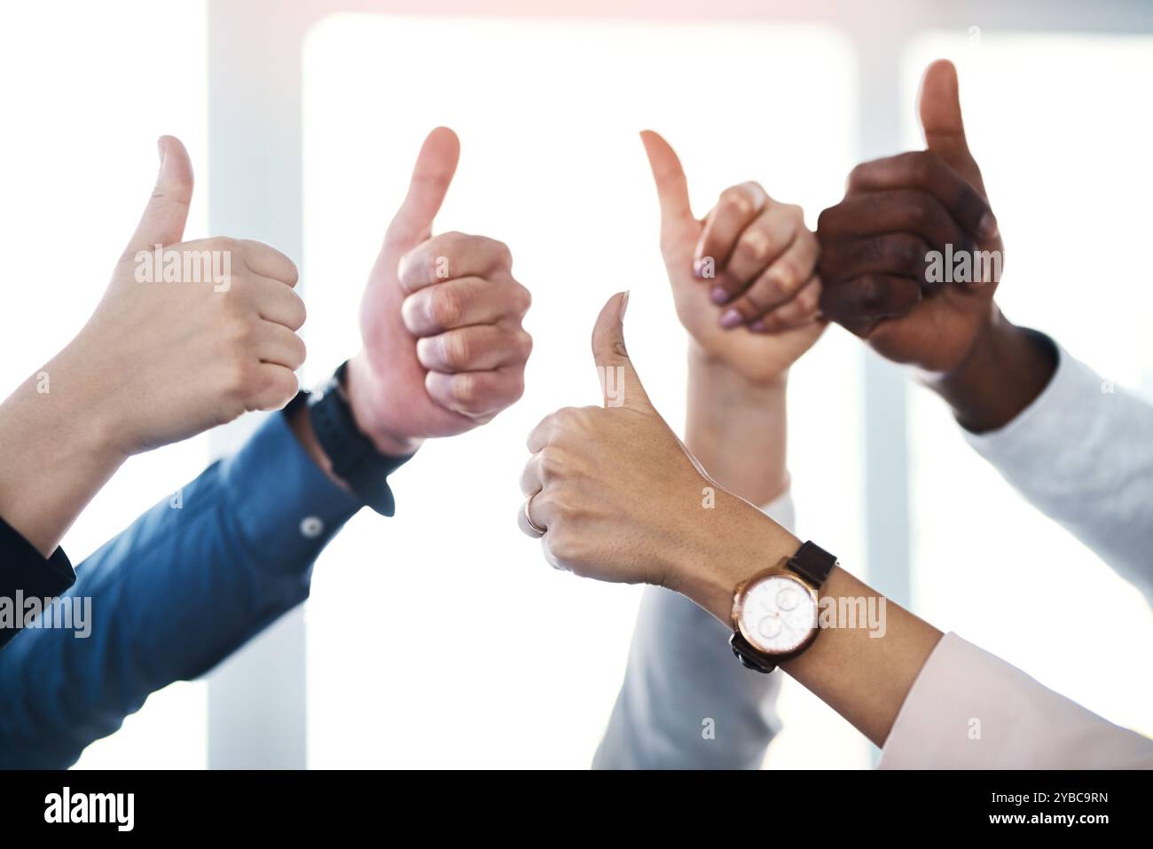 People, hands and thumbs up in office for business, good job or ...