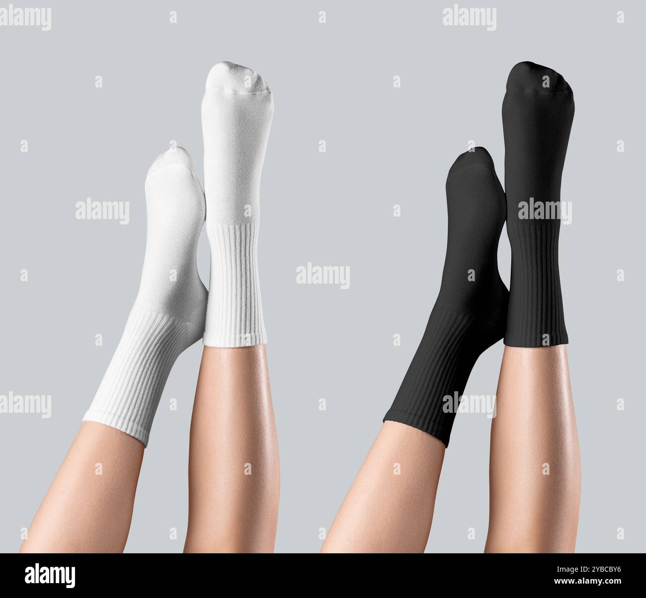 Mockup of white, black high socks on female slender legs upside down ...