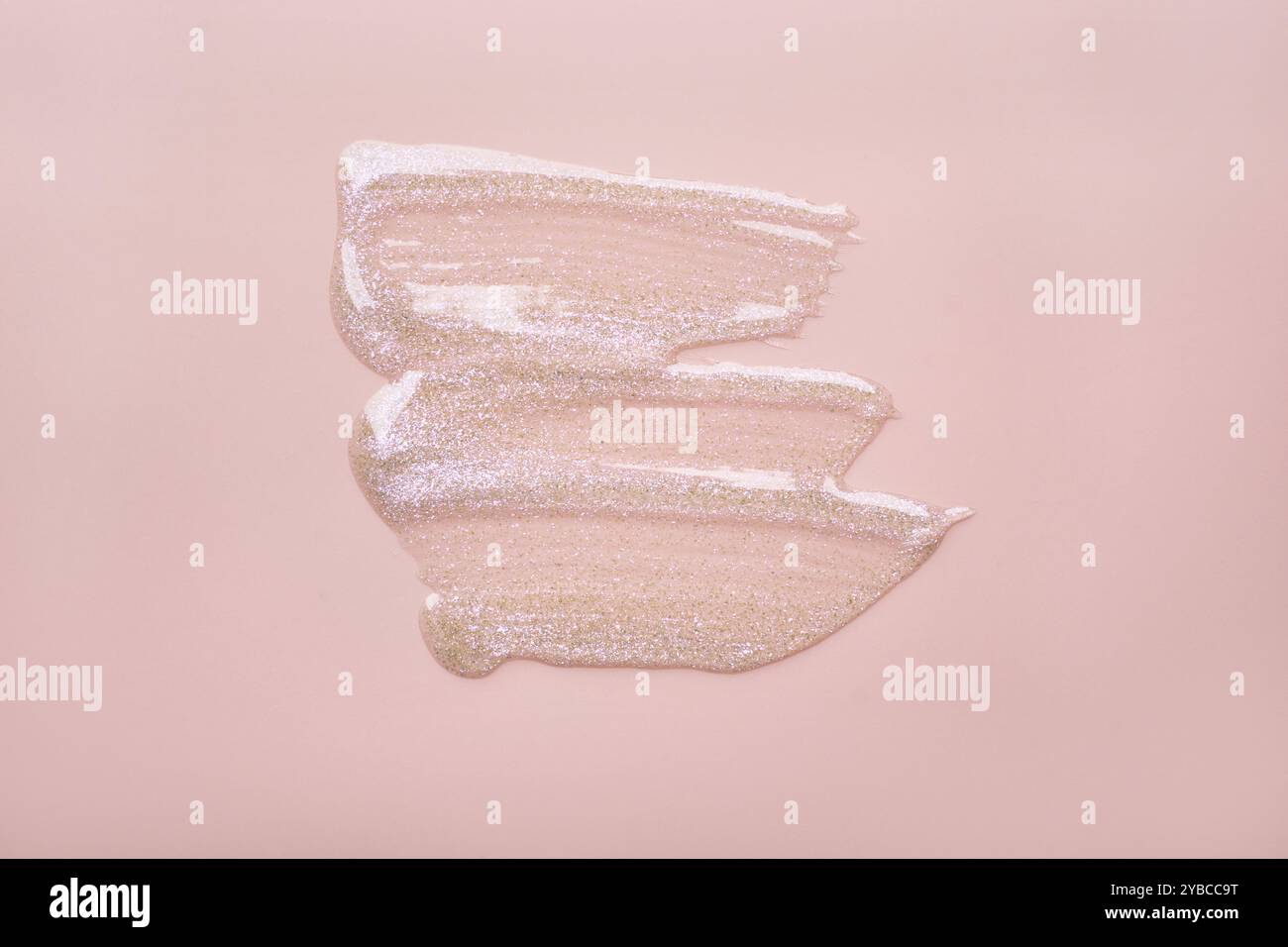 Shimmering pink glitter makeup swatch on pale background Stock Photo ...