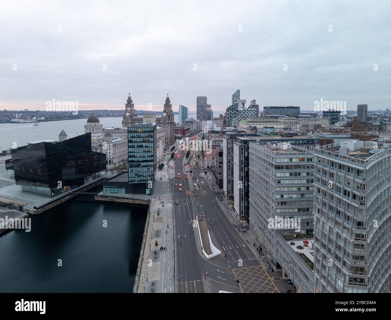 Aerial view of liverpool city center at sunset showing the three graces ...
