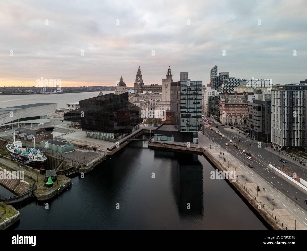 Aerial view of liverpool city centre at sunset, showing the liver ...