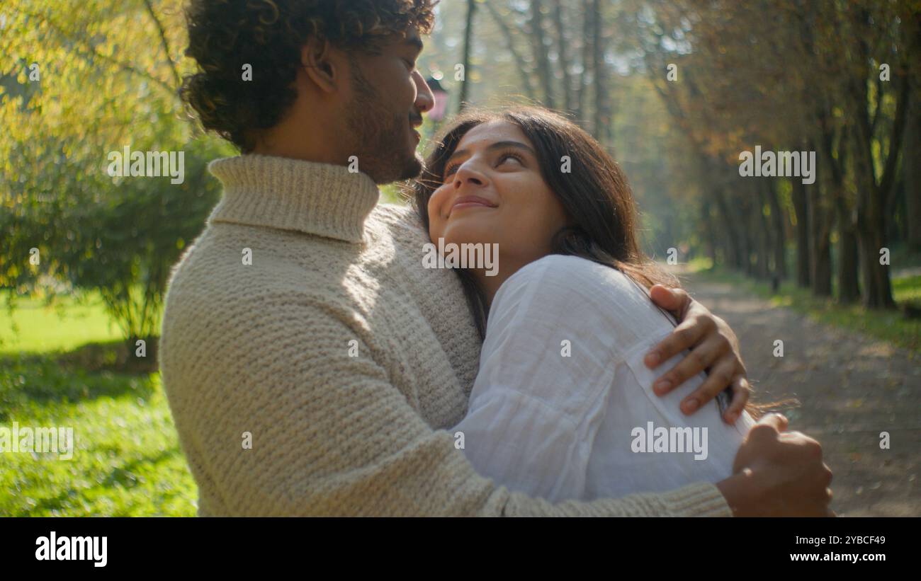 Happy multiethnic loving romantic couple family Arabian Indian man ...
