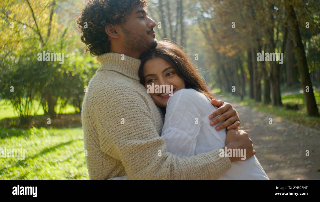Happy multiethnic loving romantic couple family Arabian Indian man ...