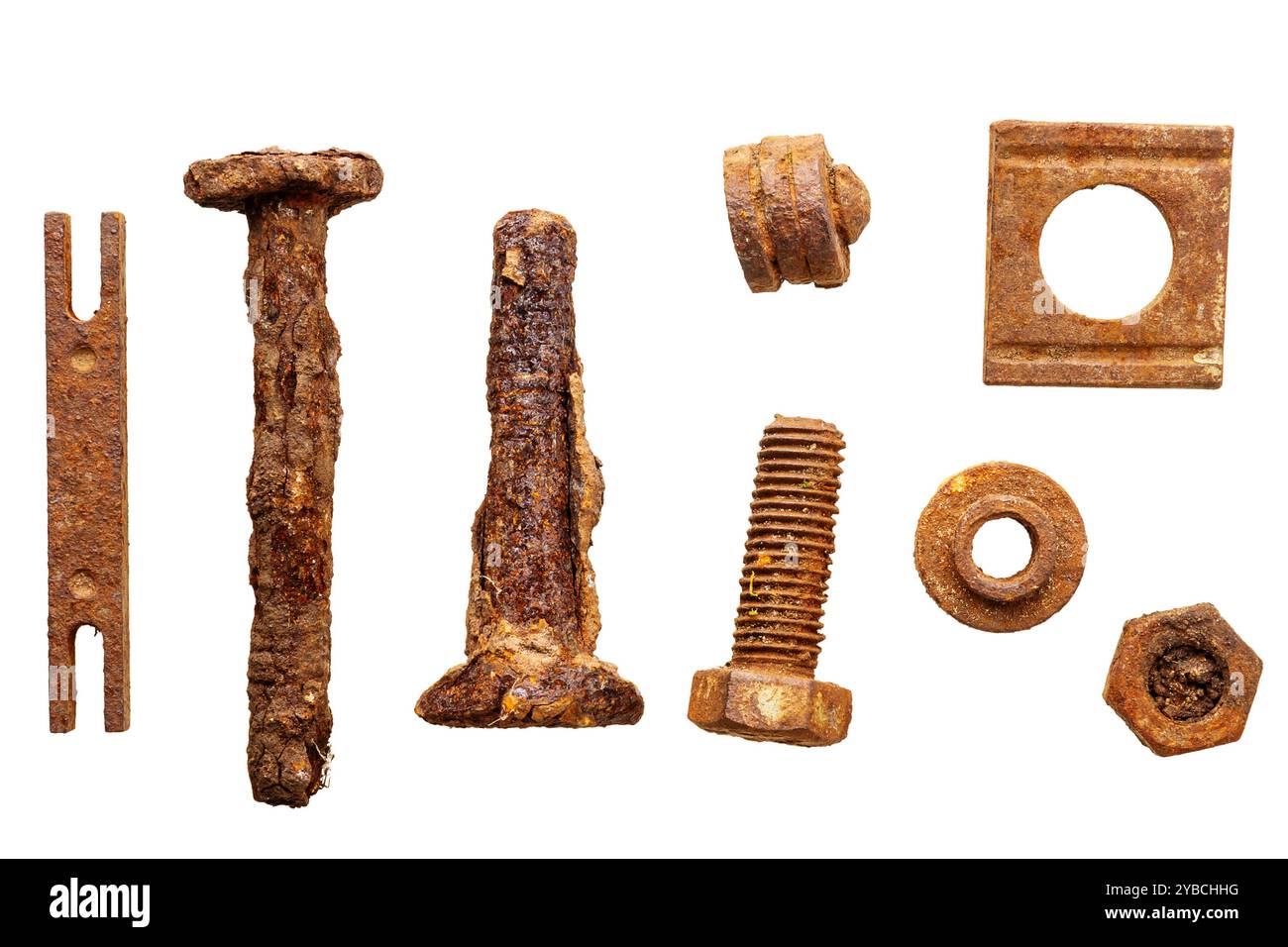 Collection of rusty bolts, screws, and nuts isolated on a white ...