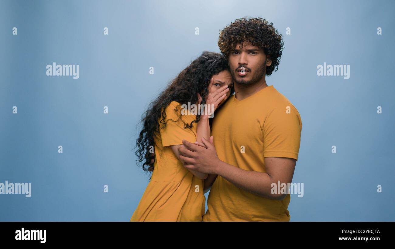 Multiracial shocked scared afraid couple amazed shocked Hispanic woman ...