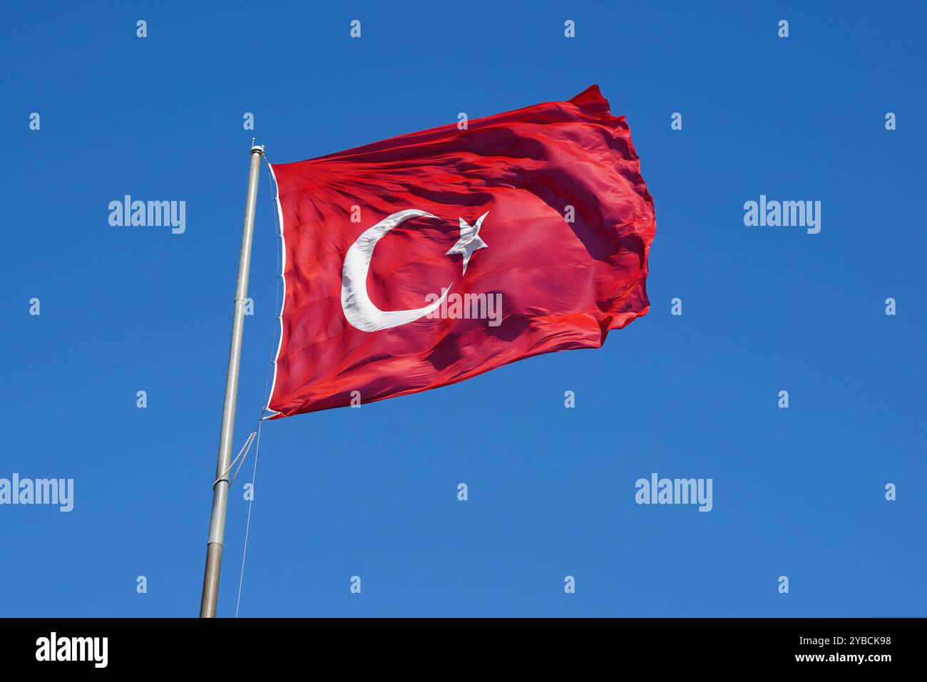 Red flag featuring a white star hi-res stock photography and images - Alamy