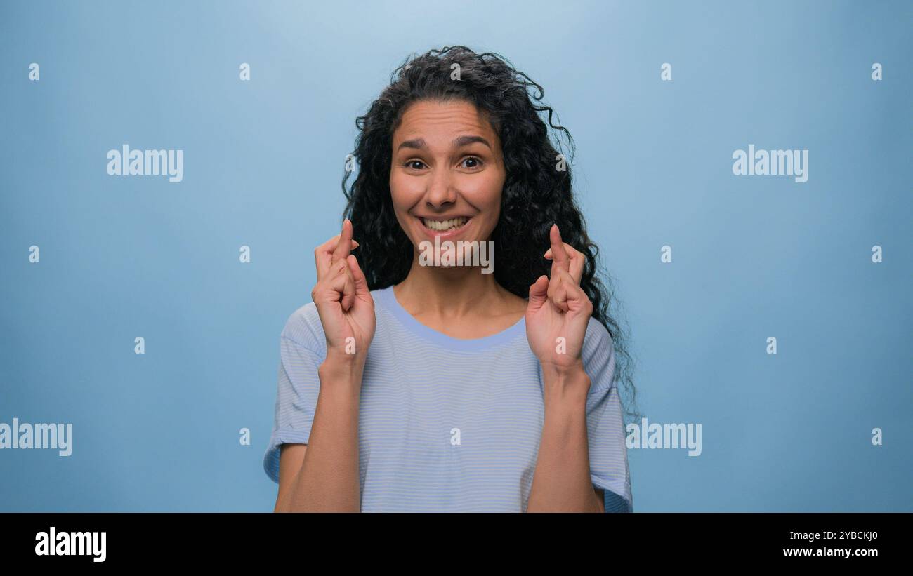 Happy hopeful Indian woman Latino girl Arabian female model fingers ...