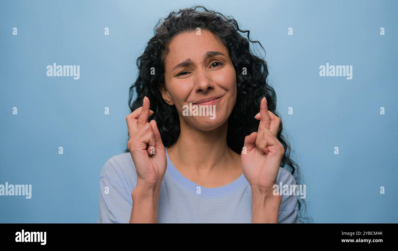 Happy hopeful Indian woman Latino girl Arabian female model fingers ...