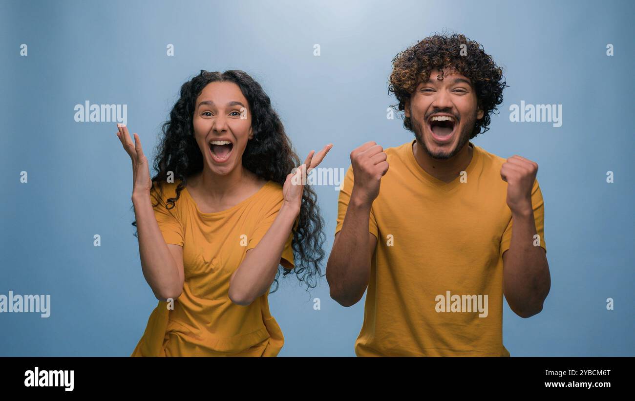 Excited happy shocked wonder amazed surprised Arabian couple winners ...