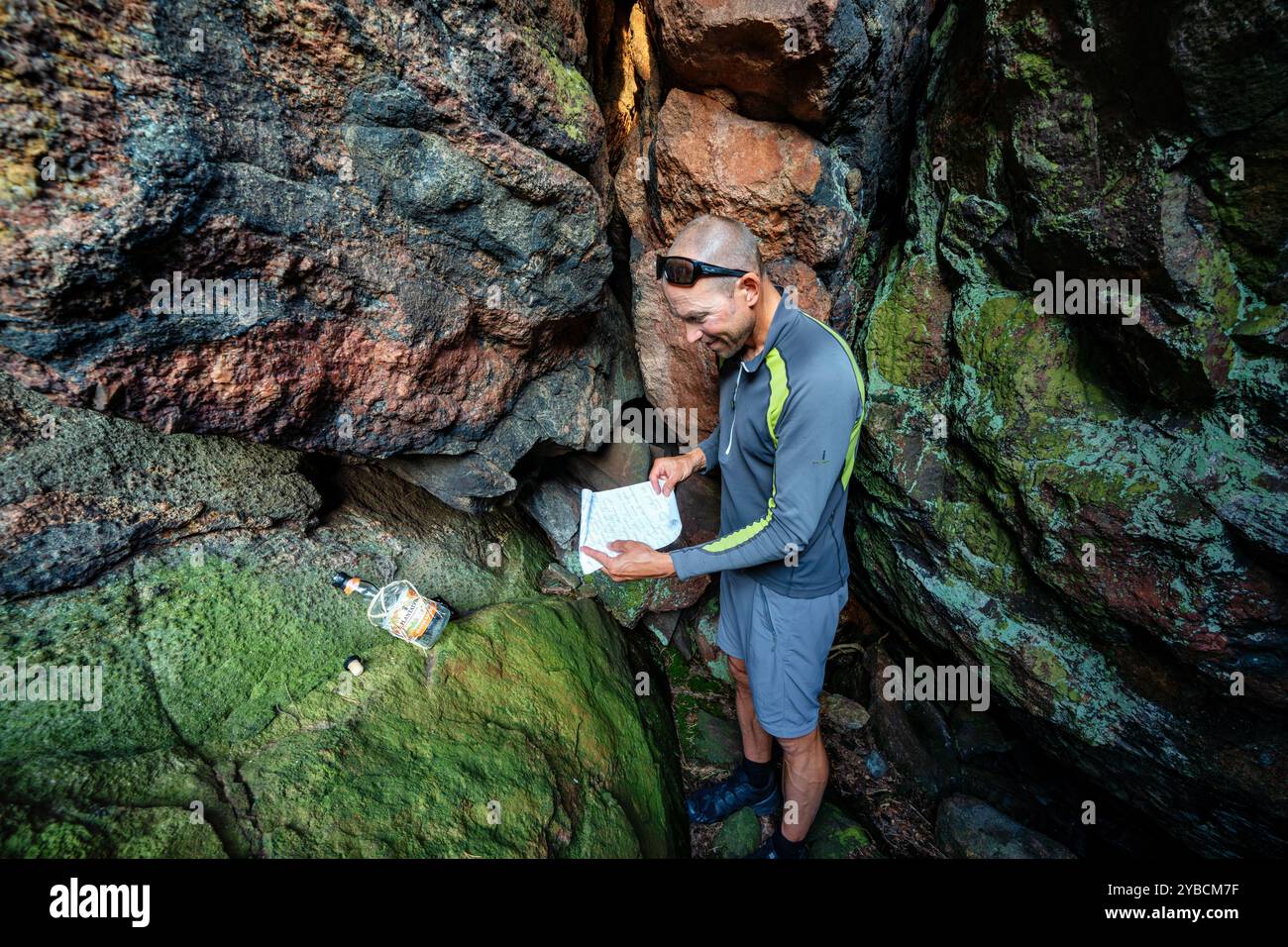 Exploring a cave and the bottle message from there, at Parainen ...