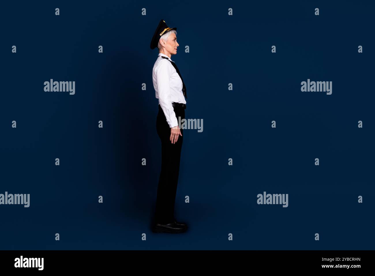 Full body photo of attractive senior woman passenger plane captain ...