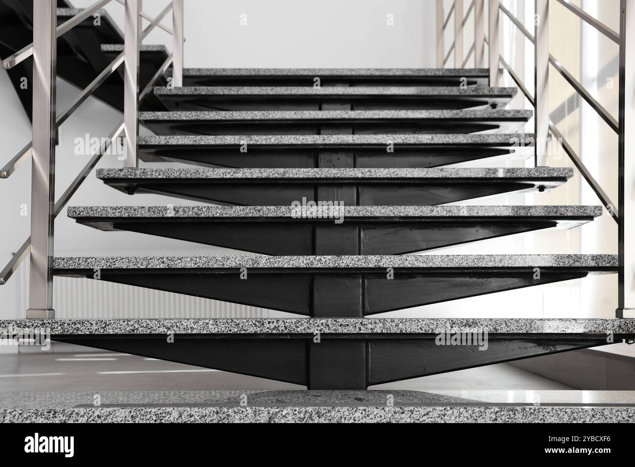 Empty staircase and metal railing indoors, closeup. Interior design ...