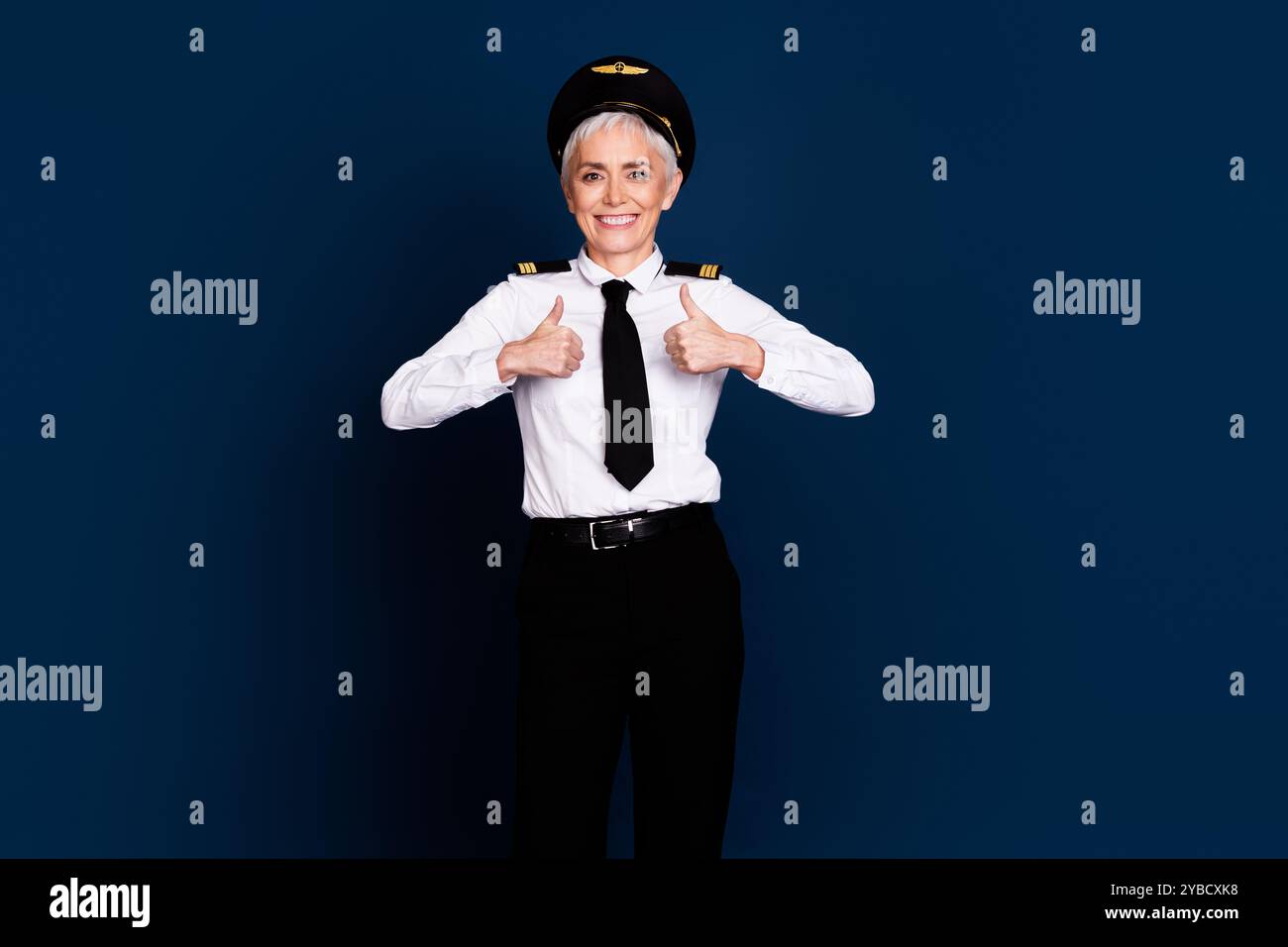 Photo portrait of pretty retired female professional airline pilot ...