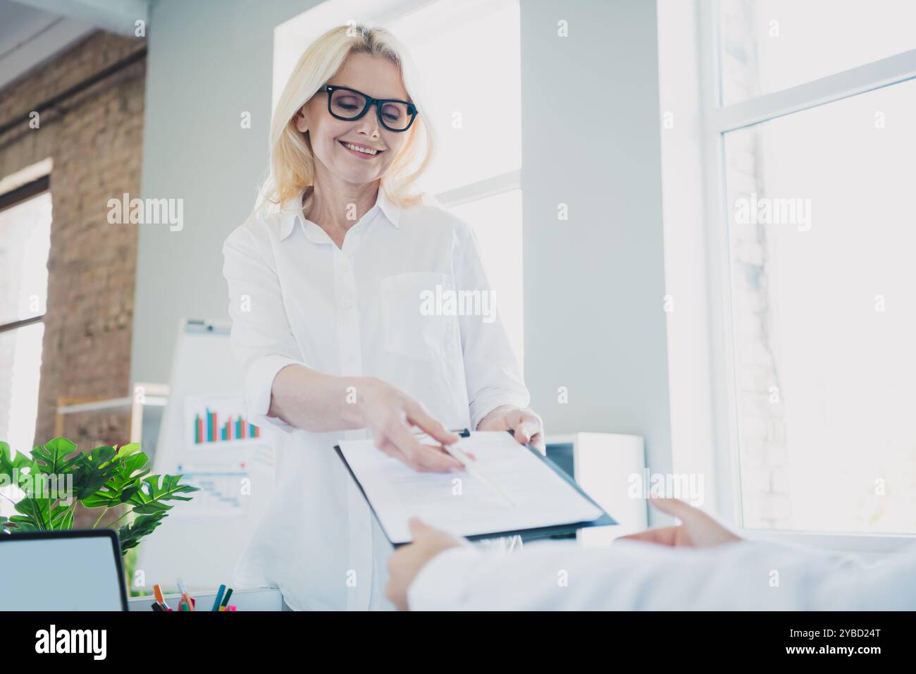 Photo of blonde executive assistant lady wearing formal white shirt and ...