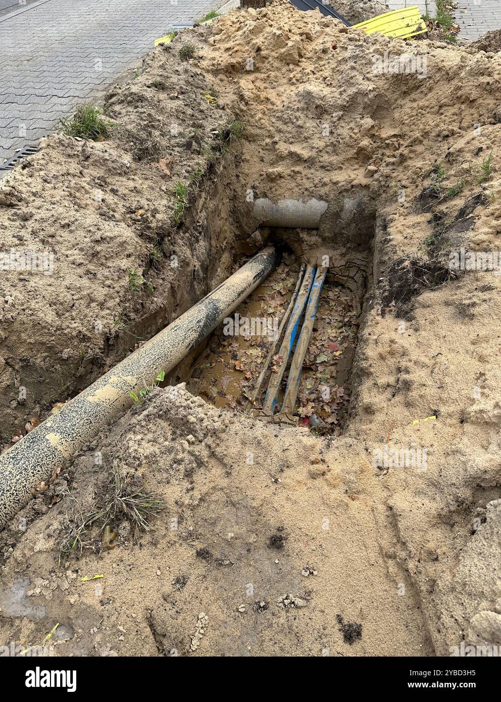 Pipe and cables at the construction site Stock Photo - Alamy