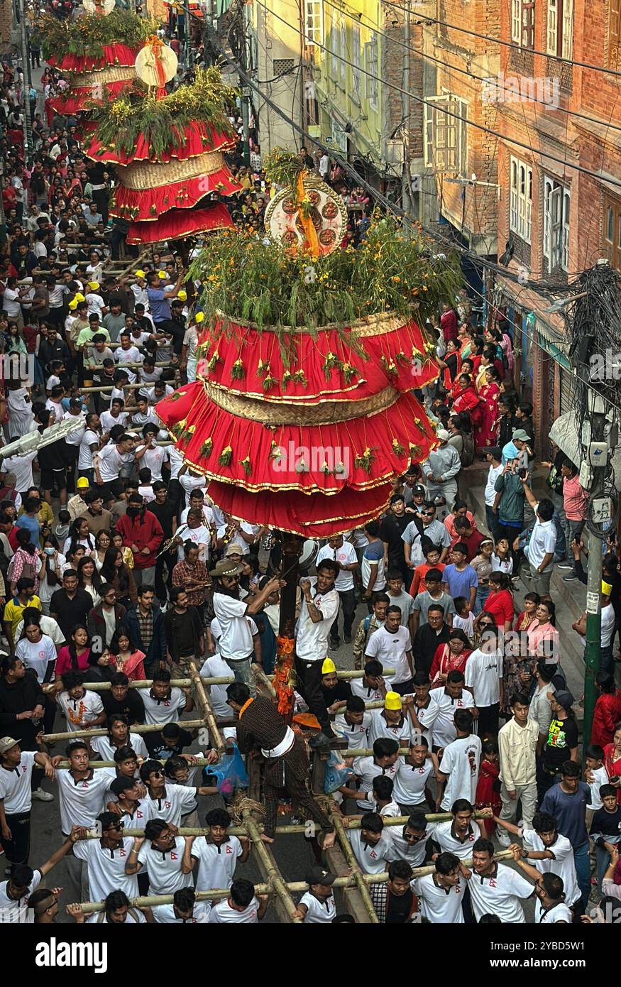 October 18, 2024: People rotate traditional chariots in celebration of ...