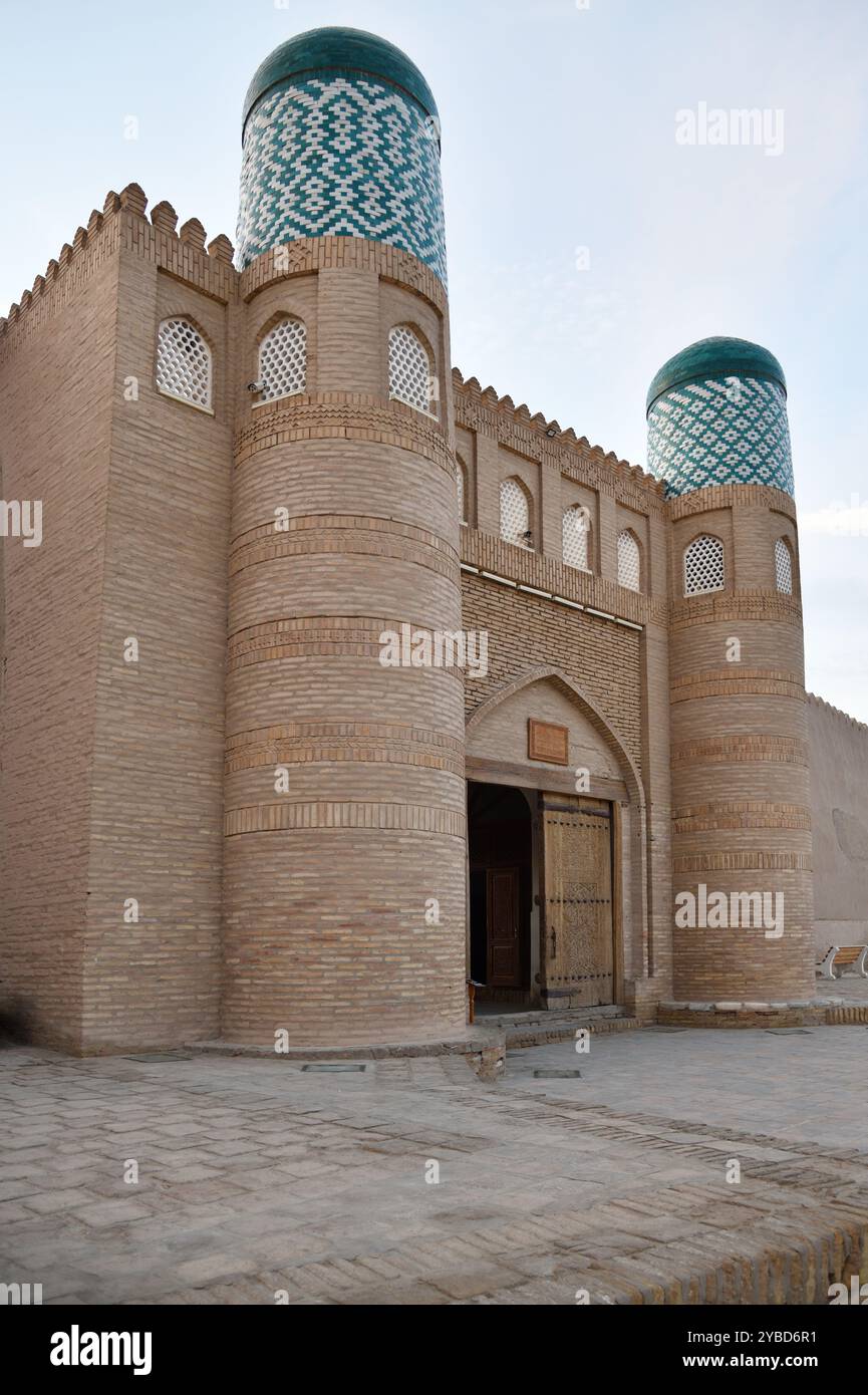 View on massive gates to the Kunya-Ark inner fortress of old city Khiva ...
