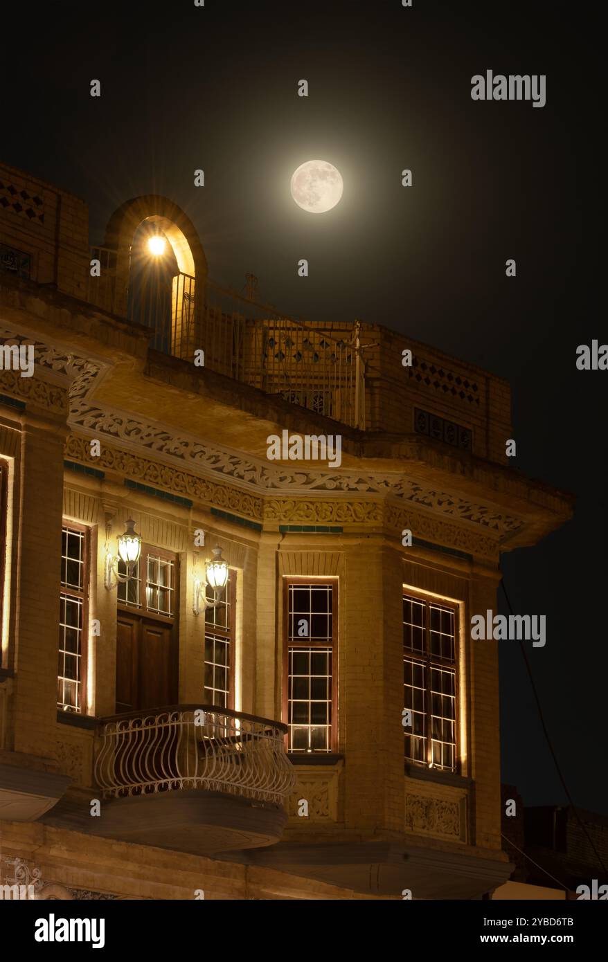 Supermoon (Hunter's Moon) rises behind a heritage house located at al ...