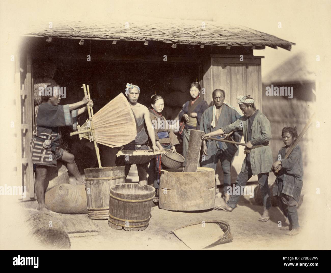 Preparation of the Rice, about 1868. A group of men and women are ...