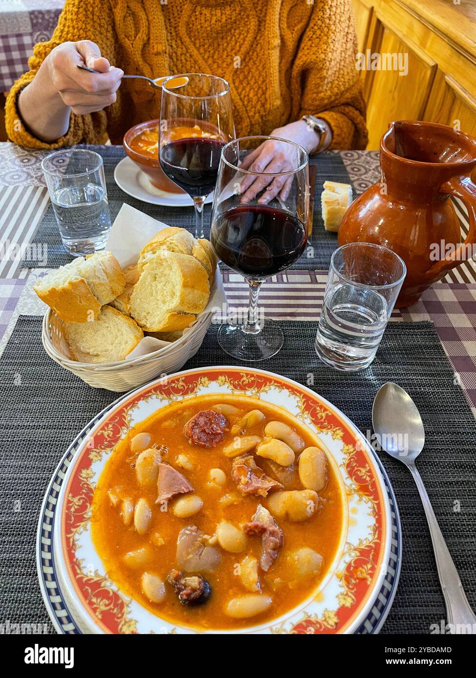 Eating beans stew. Spain Stock Photo - Alamy