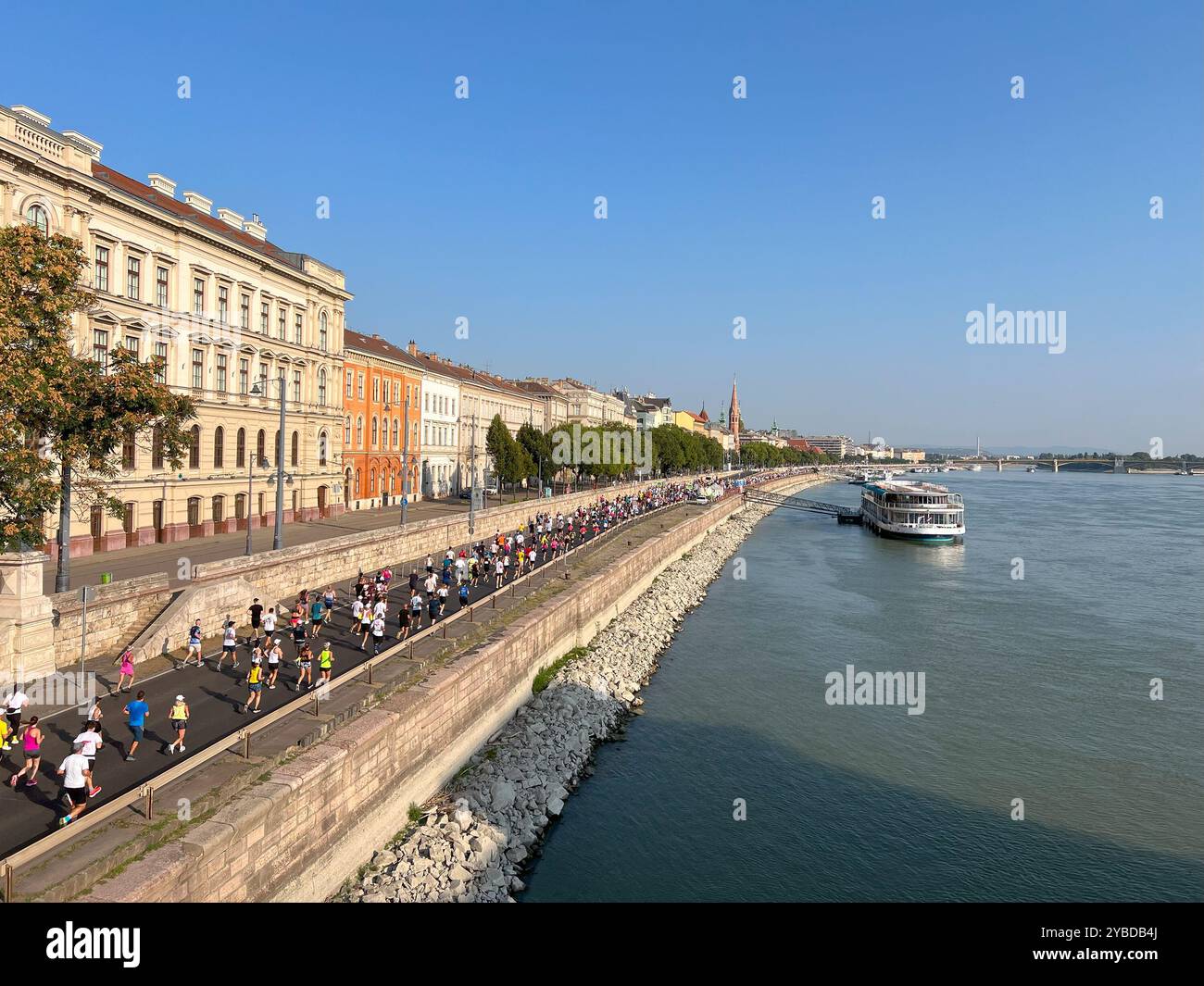 Athletic woman jogging along embankment hi-res stock photography and ...
