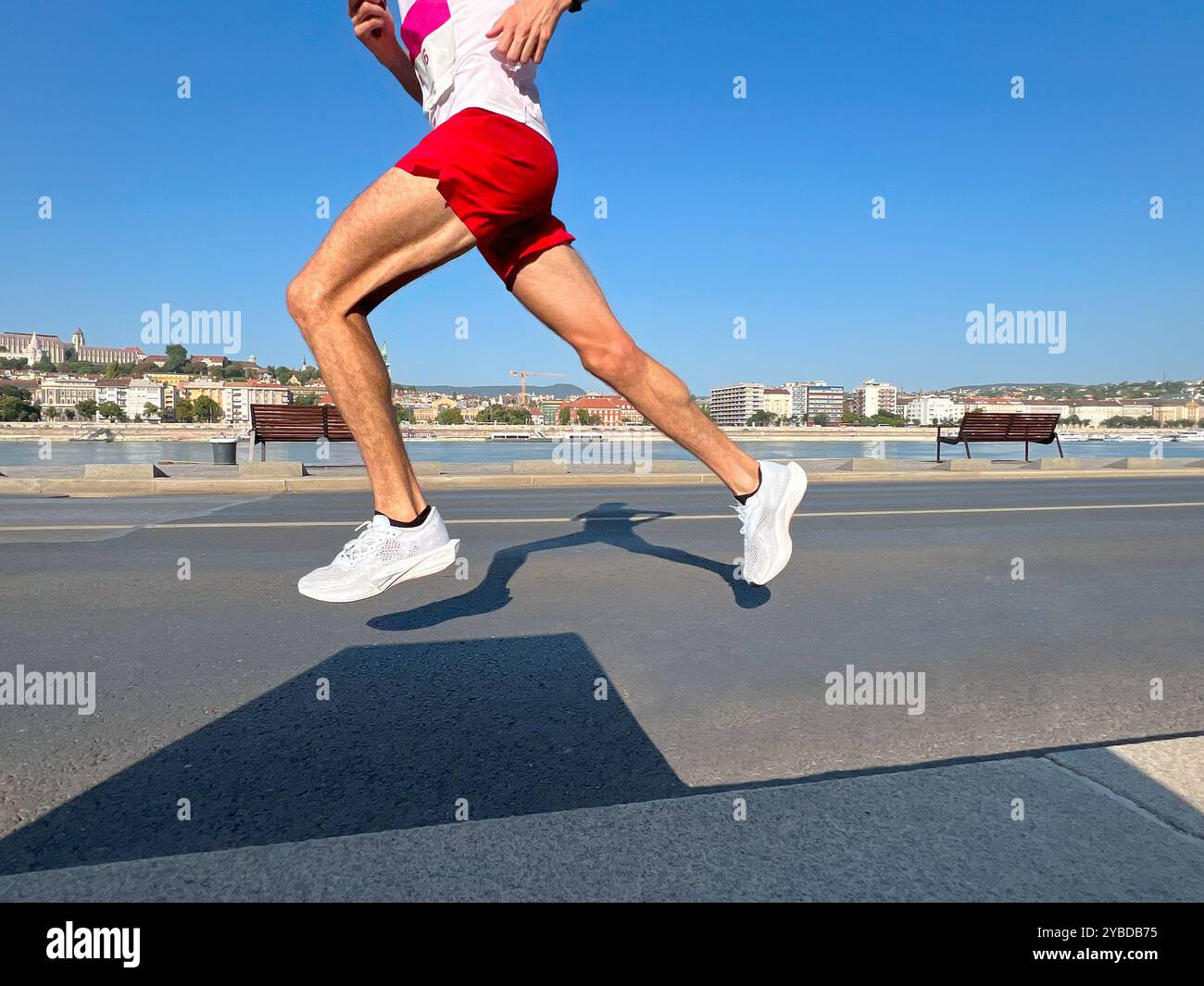 Shadow man running on street hi-res stock photography and images - Alamy